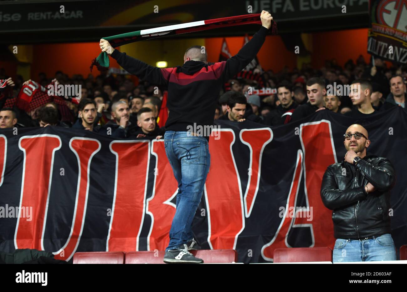 AC Milan fans show their support in the stands Stock Photo - Alamy