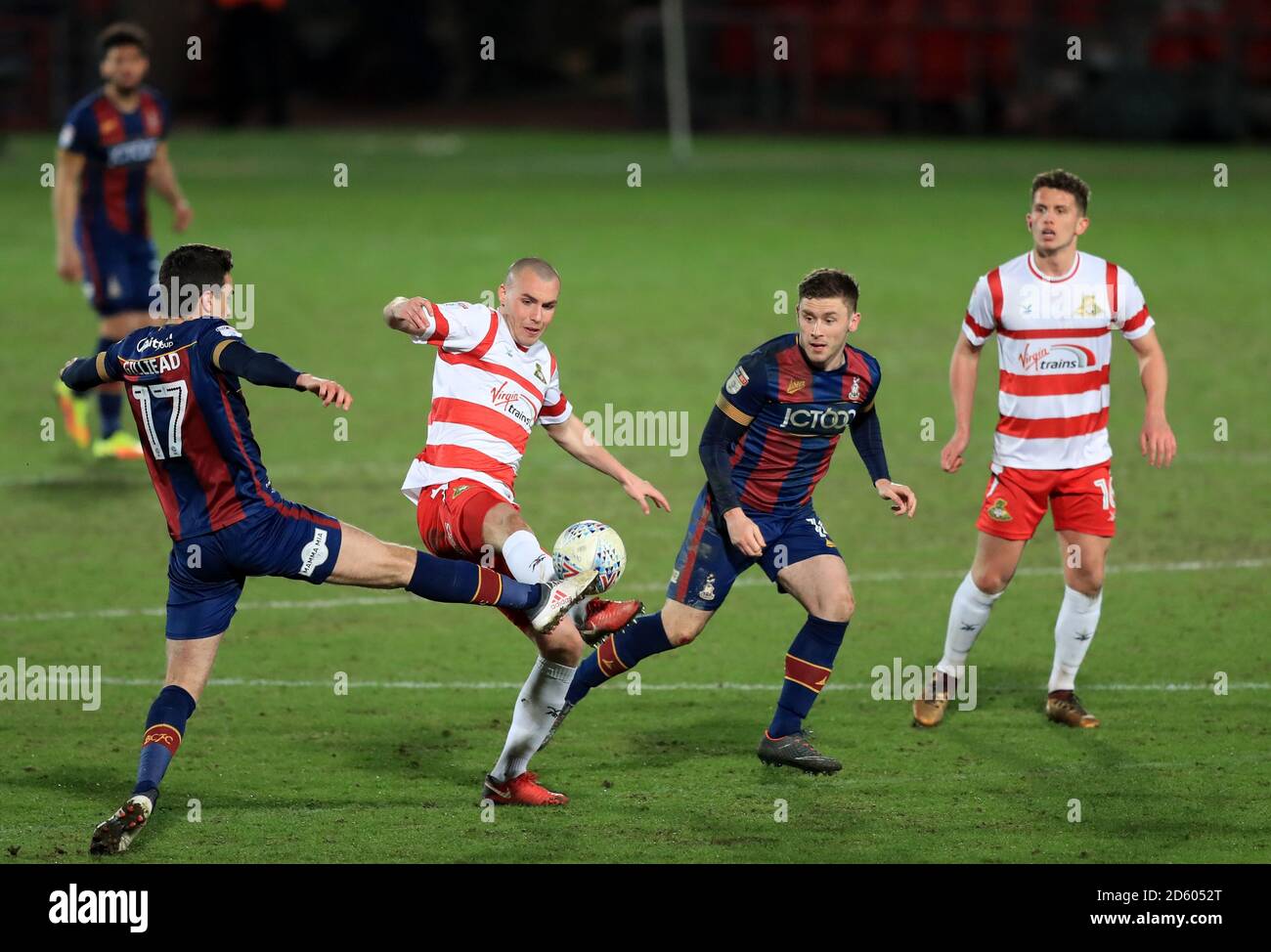 Doncaster Rovers' Luke McCulloch and Bradford City's Alex Glliead (left ...