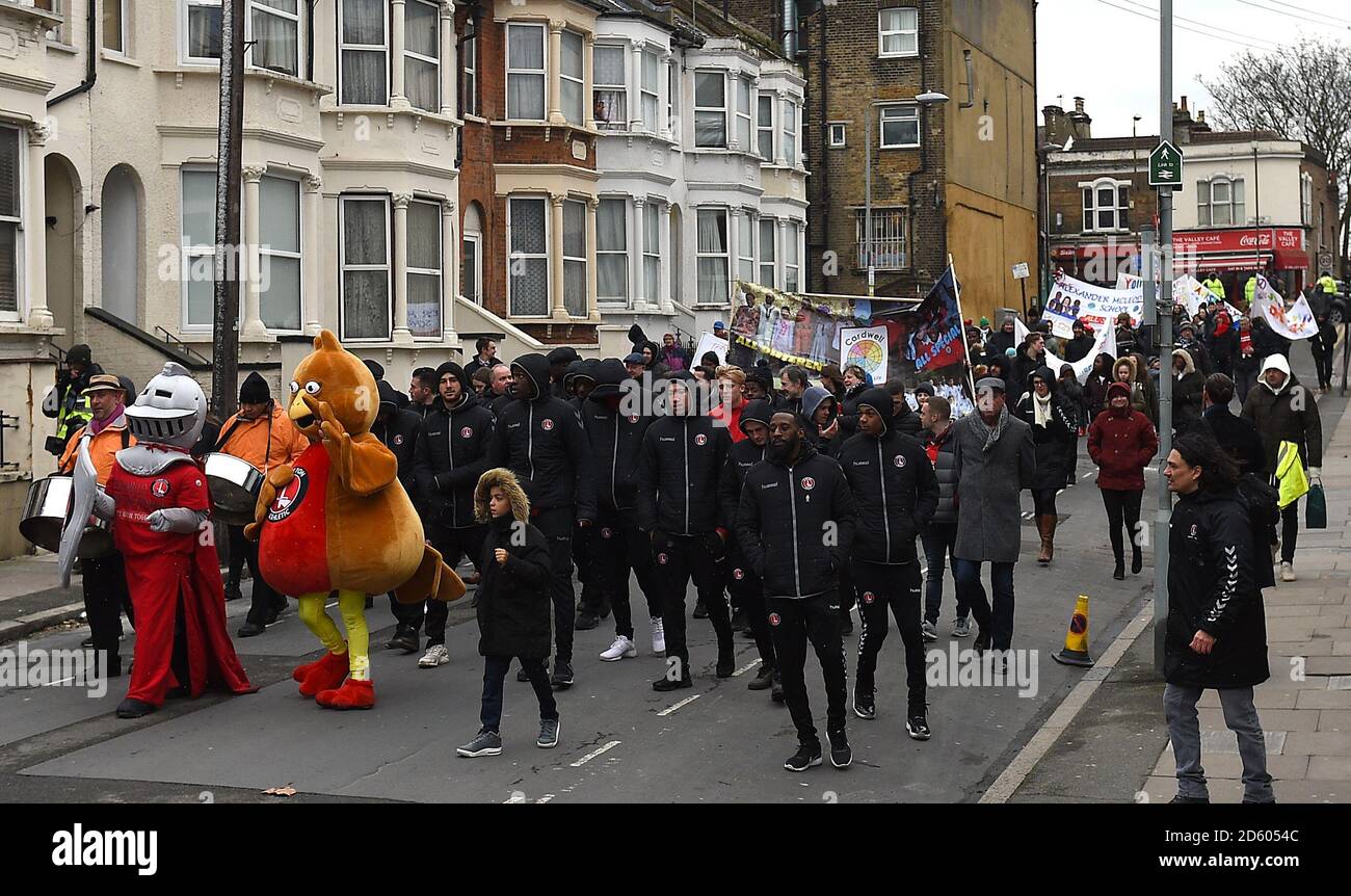 Red, white and black day procession on route to the Valley from ...