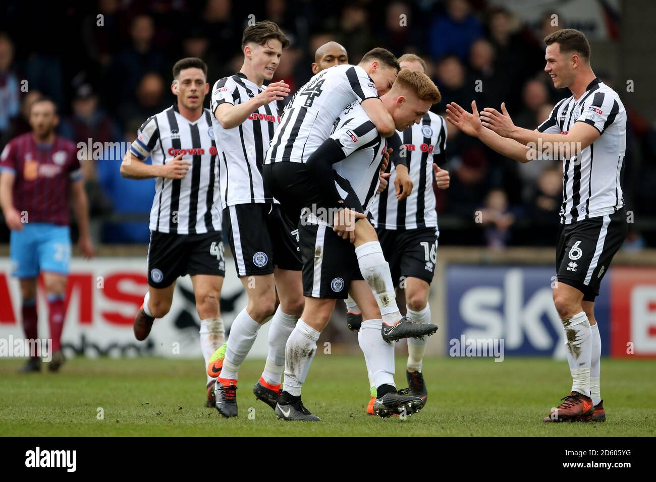 Rochdale's Callum Camps (centre) celebrates scoring his side's first ...