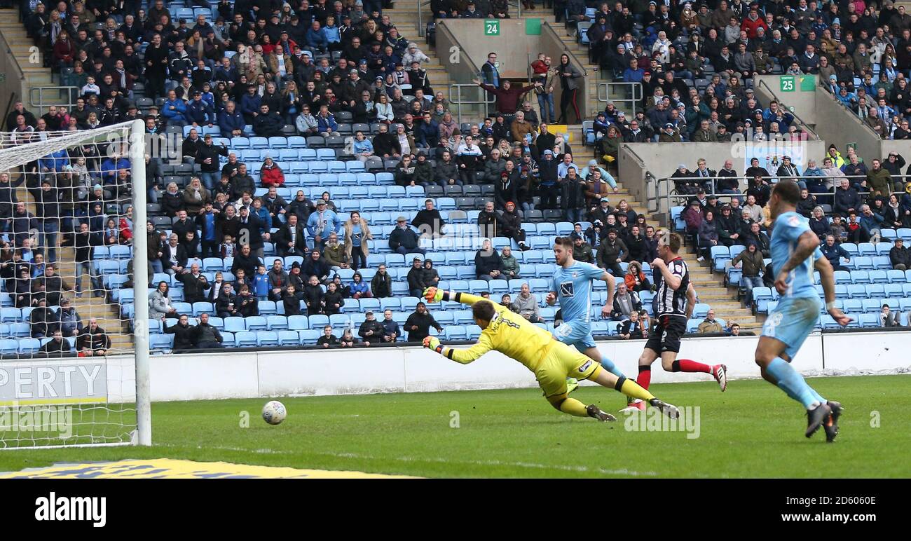 Coventry City's Marc McNulty (third right) scores his side's second ...