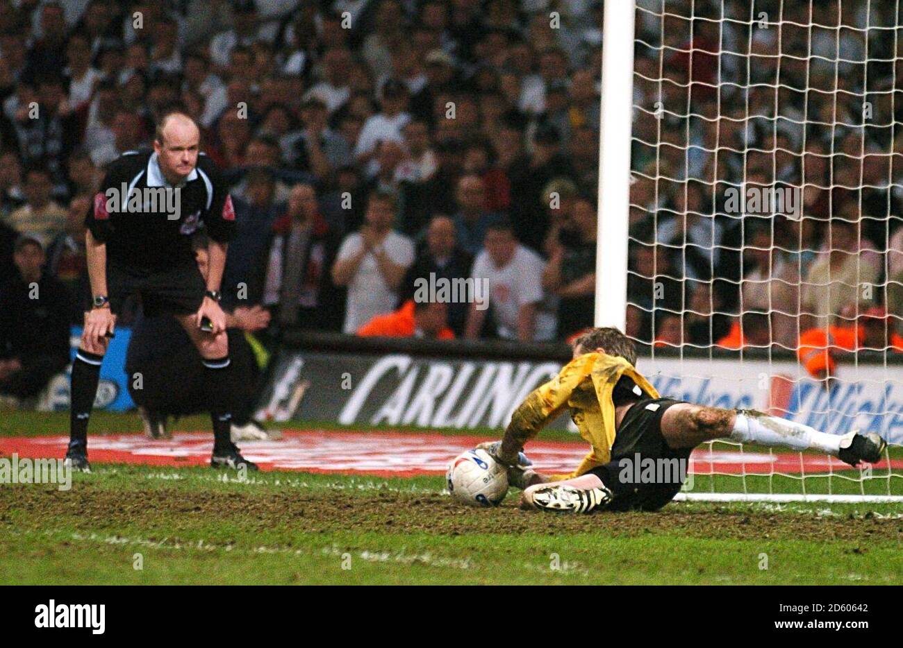 Barnsley goalkeeper Nick Colgan saves Swansea City's Alan Tate's ...