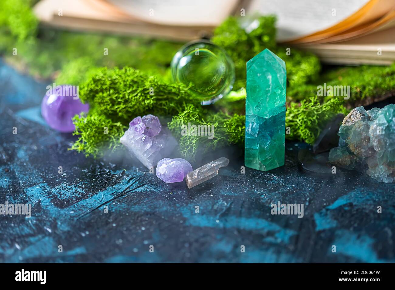 Crystalline minerals for meditation, moss, book. Magic Rock for Healing ...
