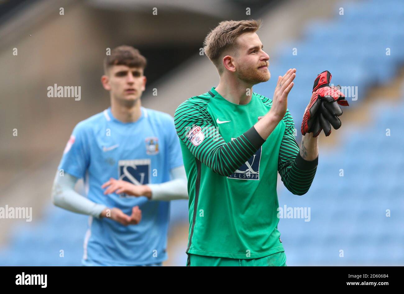 Coventry City goalkeeper Lee Burge (right) applauds the fans after the ...