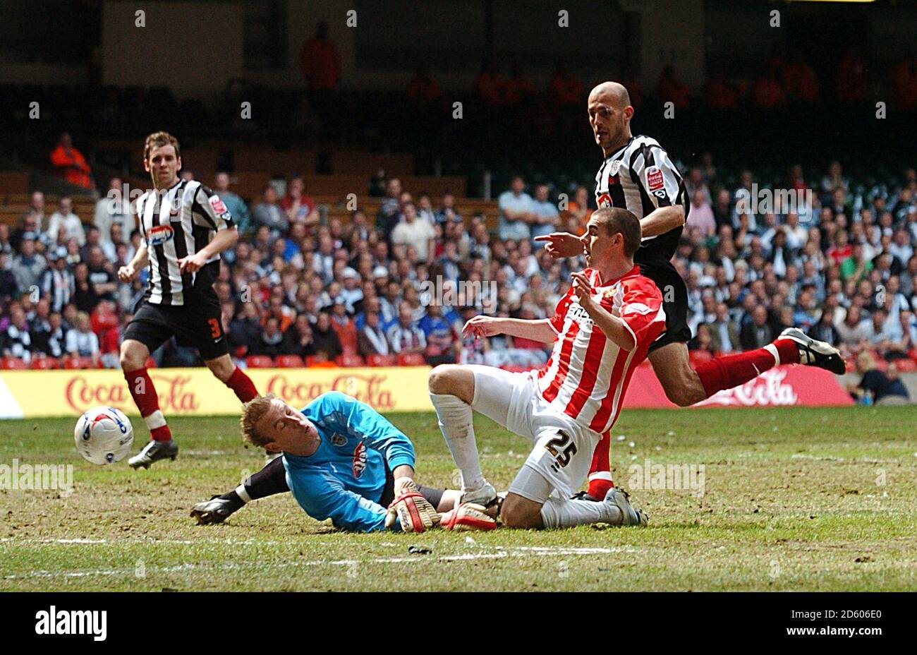 Grimsby Town's goalkeeper Steve Mildenhall saves from Cheltenham Town's ...