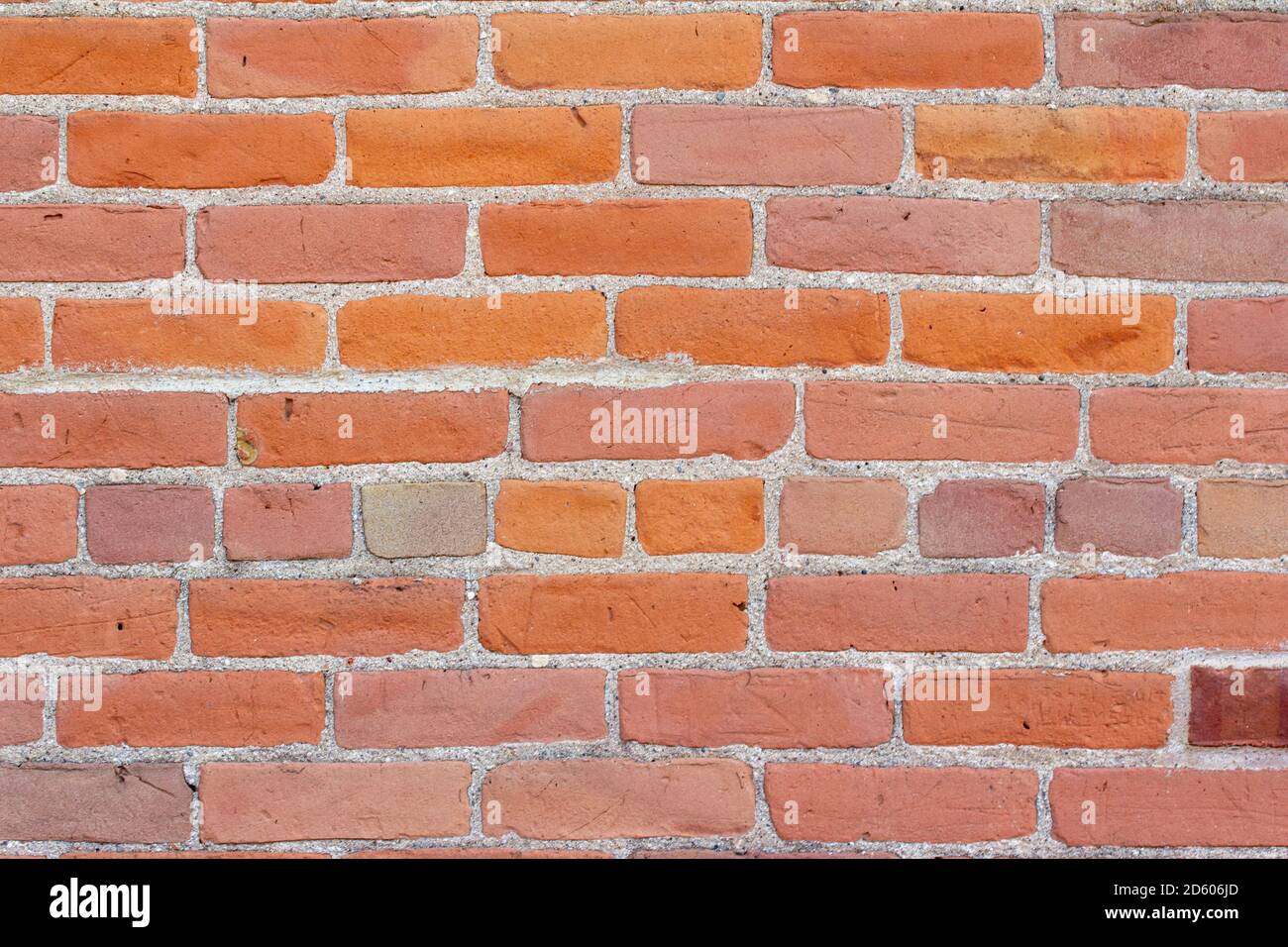 Antique red clay brick wall texture background with bricks in varying ...