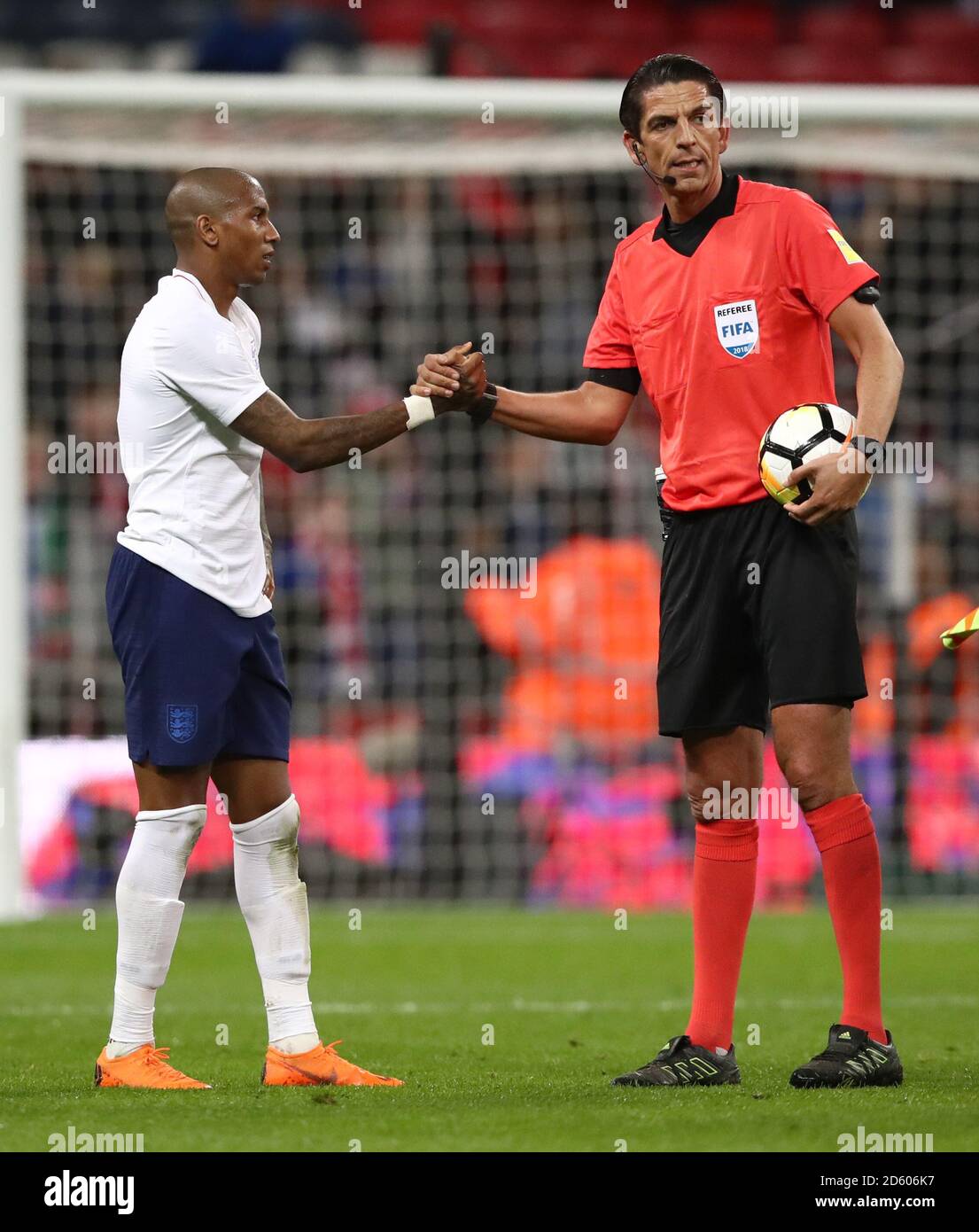 England's Ashley Young and Referee Deniz Aytekin shake hands after the ...