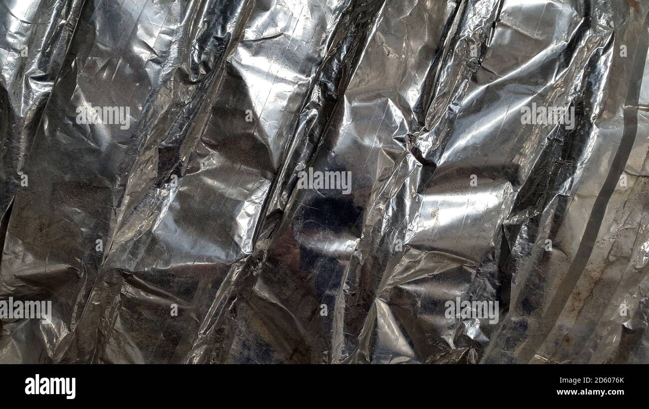 Crumpled foil. Background of crumpled foil. Creative background Stock ...