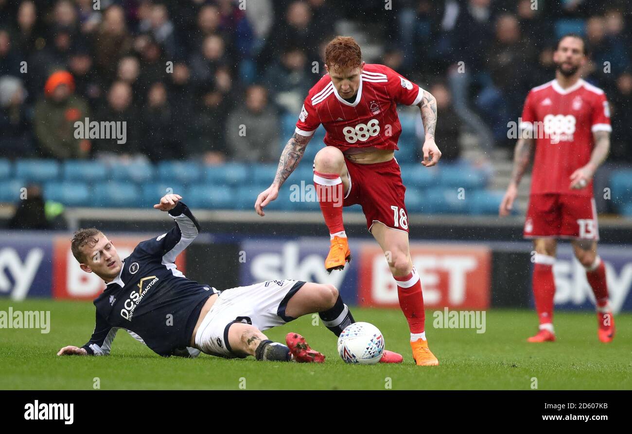 Millwall's George Saville (left) and Nottingham Forest's Jack Collback ...