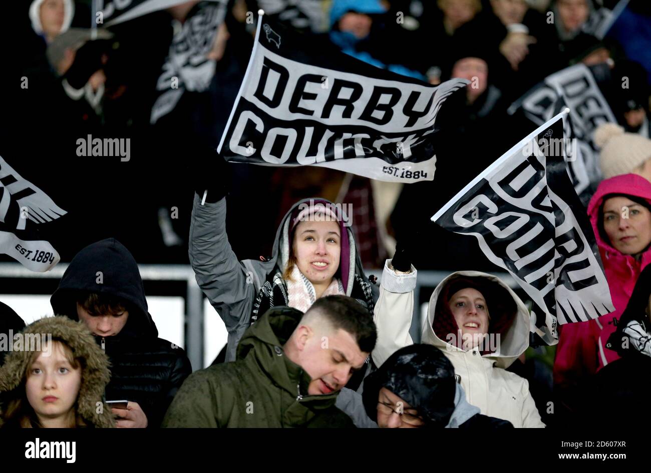 Derby County fans in the stands waves flags to show their support Stock ...