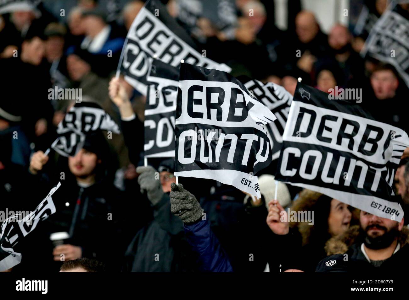 Derby County fans in the stands waves flags to show their support Stock ...