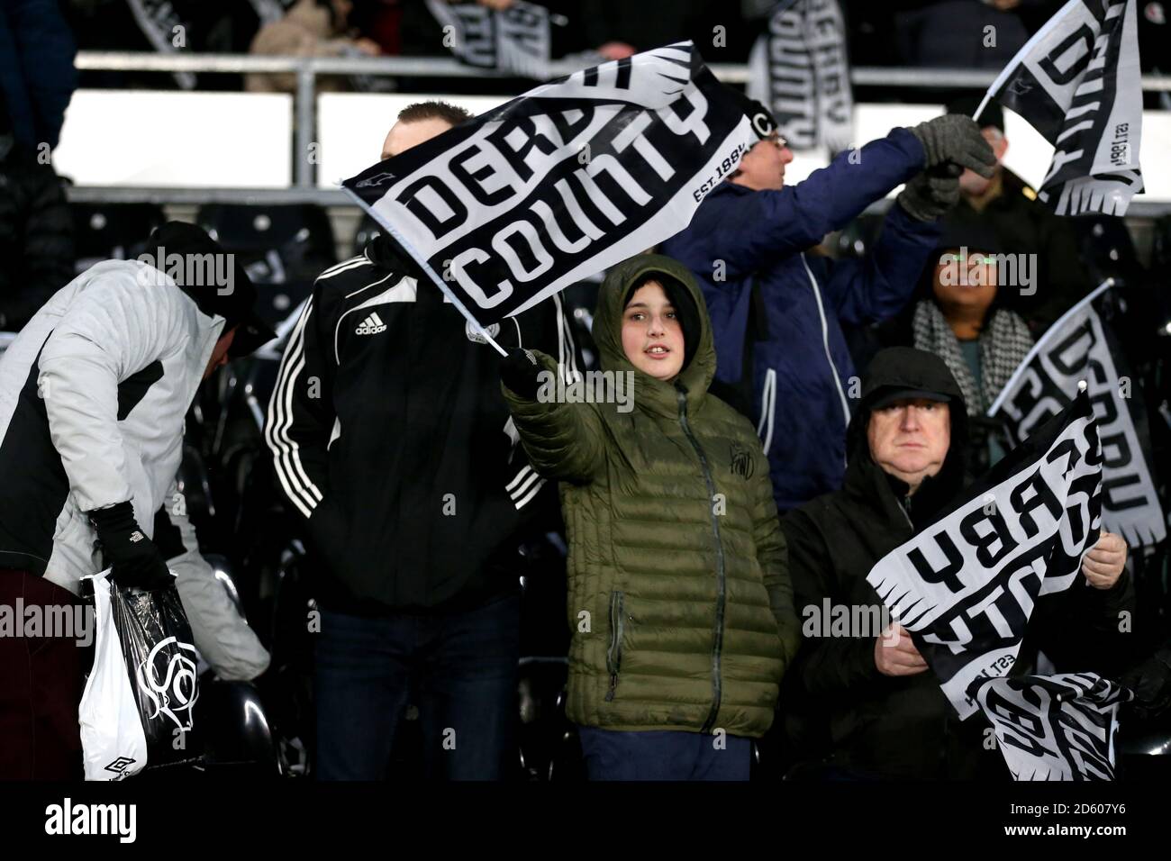 Derby County fans in the stands waves flags to show their support Stock ...