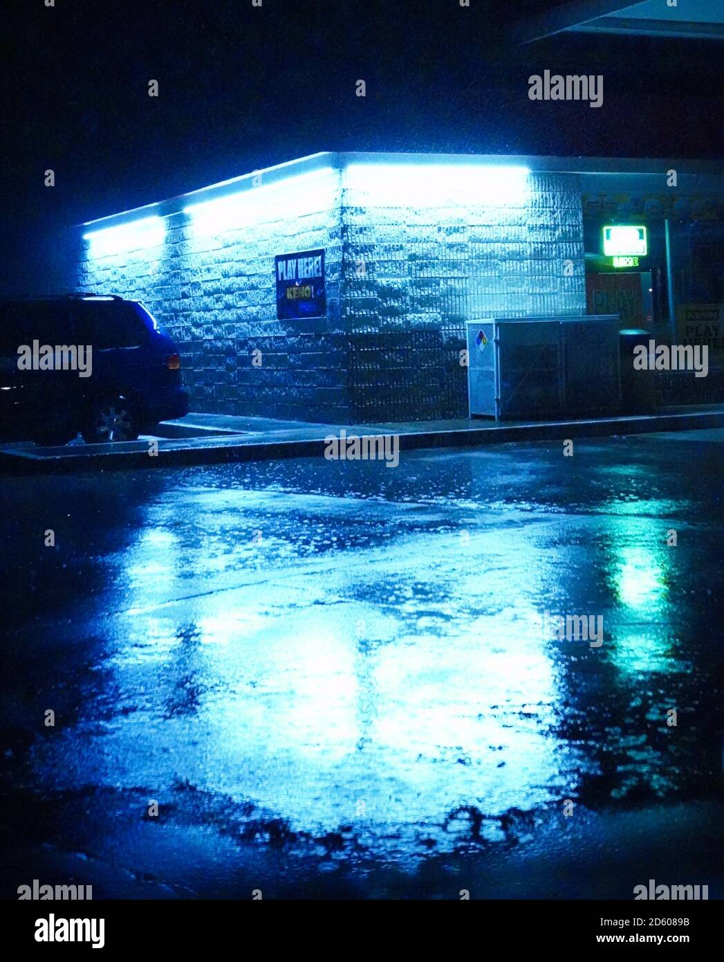 Gas Station Glow at Night Stock Photo - Alamy