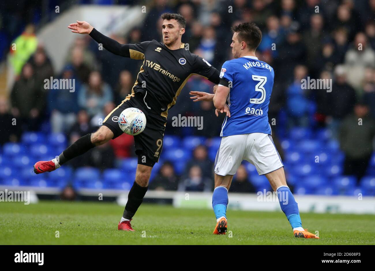 Millwall's Lee Gregory and Ipswich Town's Jonas Knudsen Stock Photo - Alamy