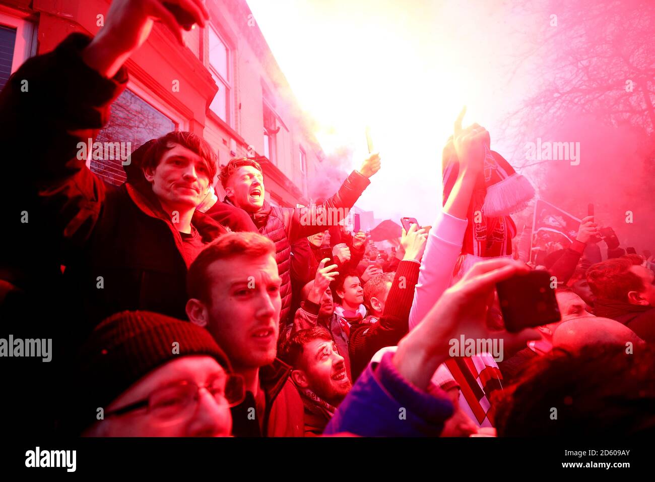 Liverpool fans set off flares and show support for their team Stock ...