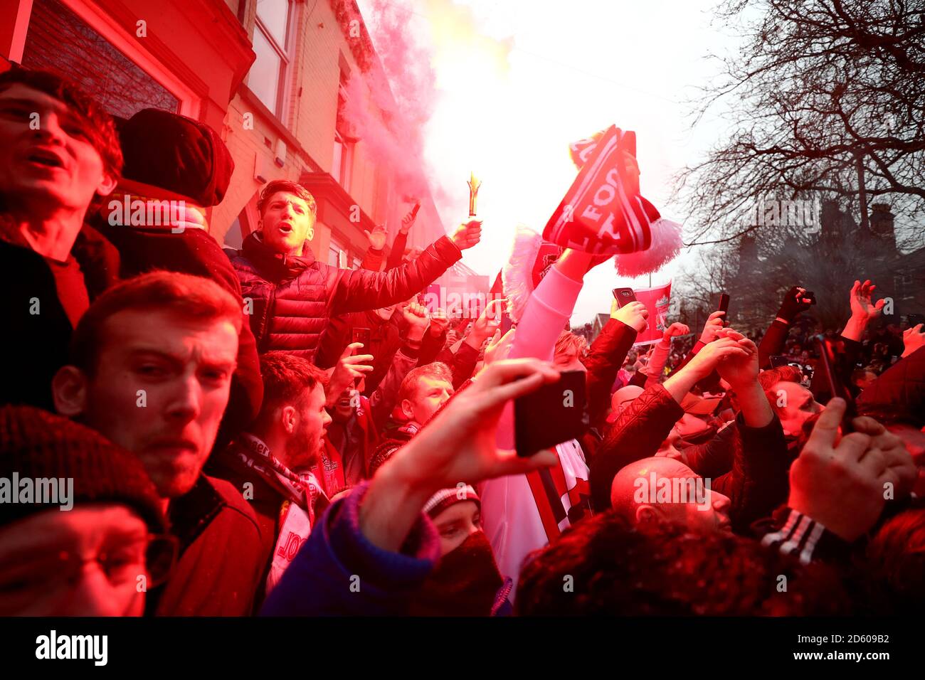 Liverpool fans set off flares and show support for their team Stock ...