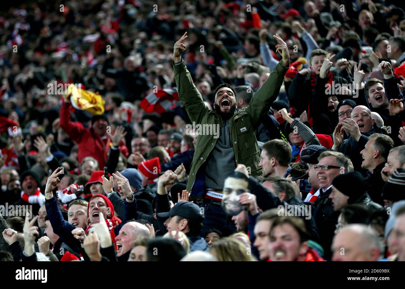 *EDITORS NOTE OFFENSIVE GESTURE* Liverpool fans celebrate in the stands ...