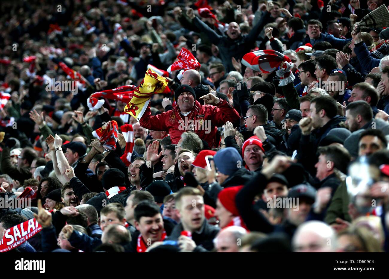 Liverpool fans celebrate in the stands after Liverpool's Mohamed Salah ...