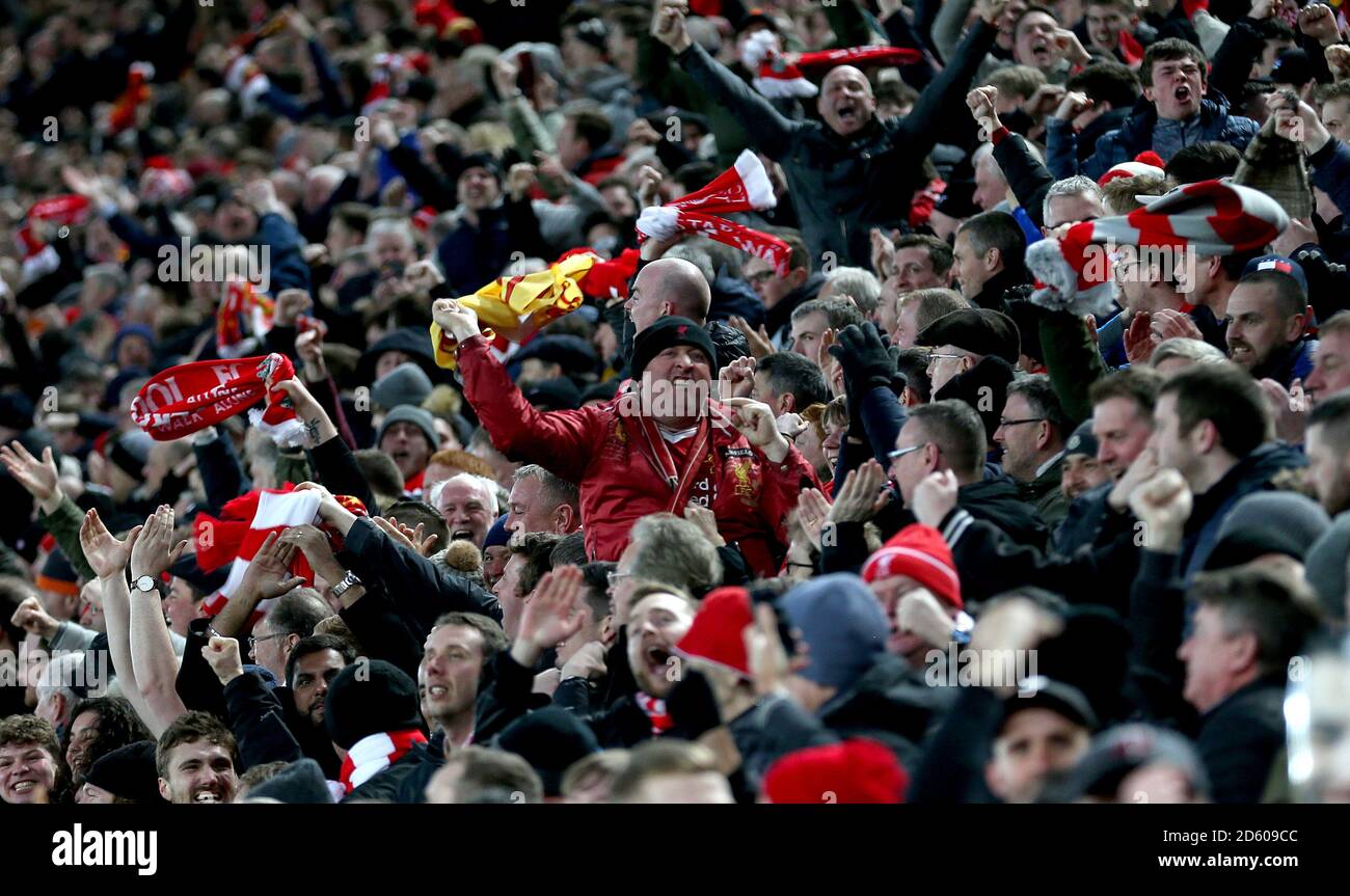 Liverpool fans celebrate in the stands after Liverpool's Mohamed Salah ...