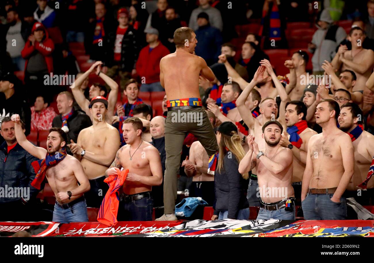 Shirtless CSKA Moscow fans in the stands show their support during the ...