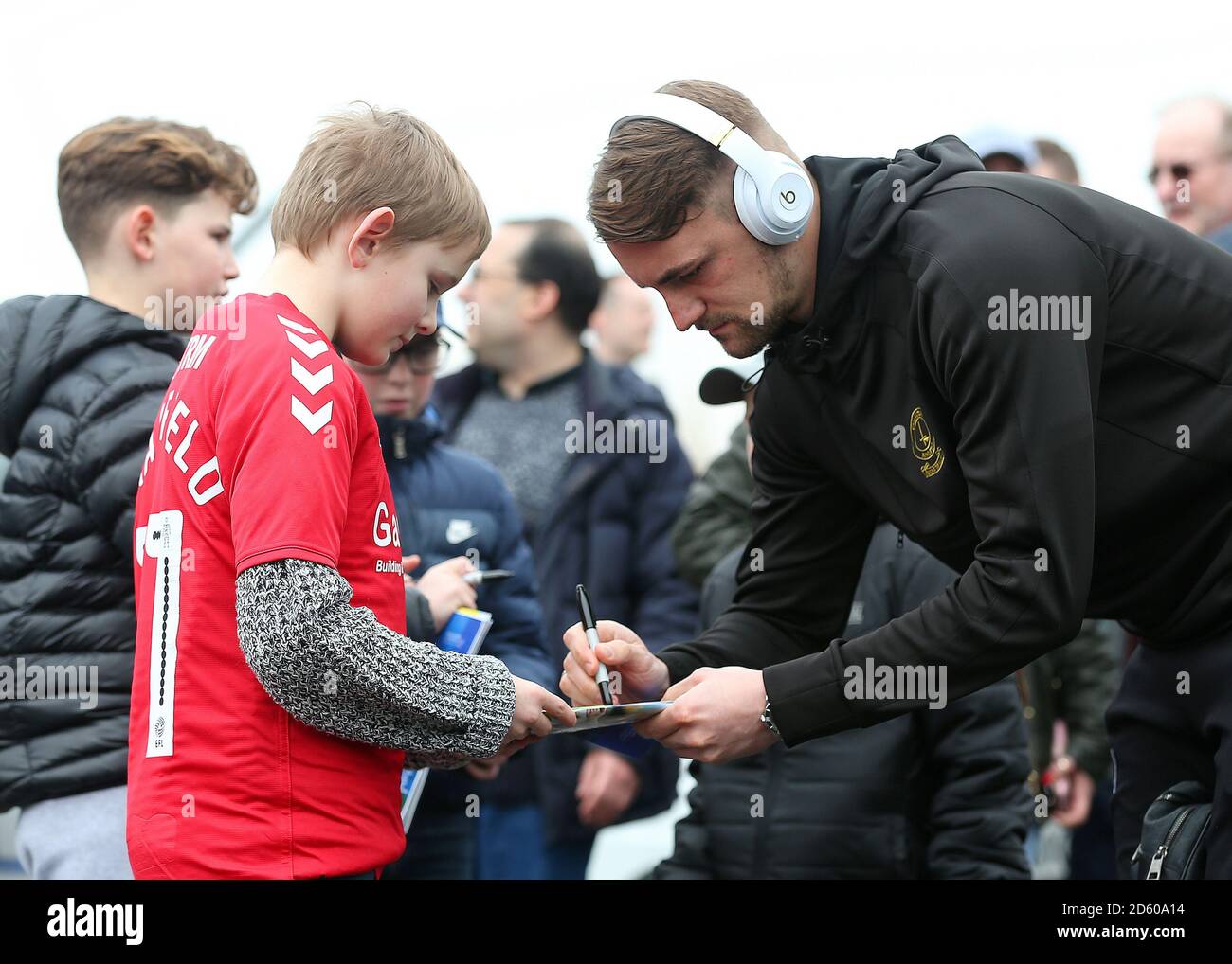 Charlton Athletic's Patrick Bauer signs an autograph book as he arrives ...