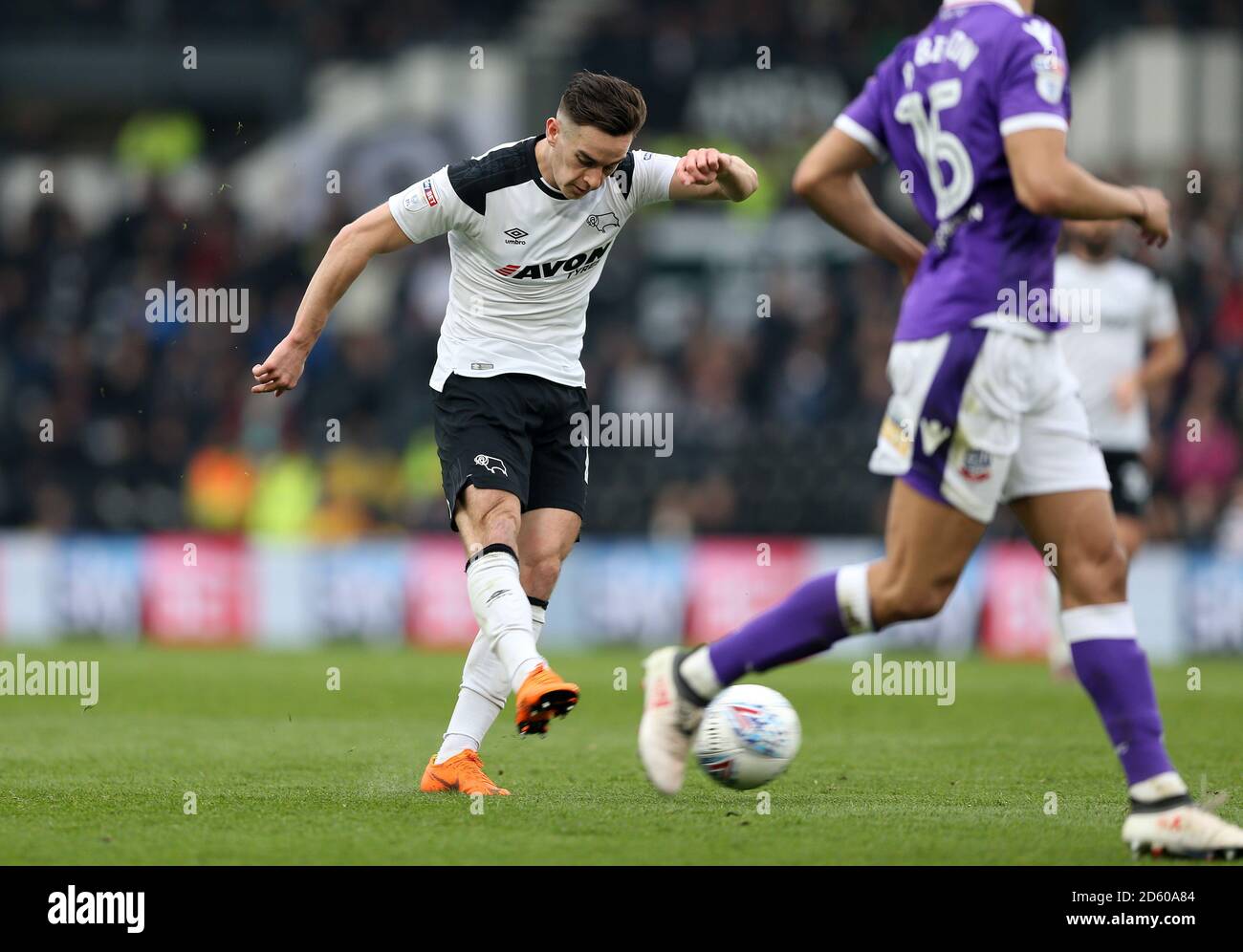 Derby County's Tom Lawrence (left) scores the 3rd goal against Bolton ...