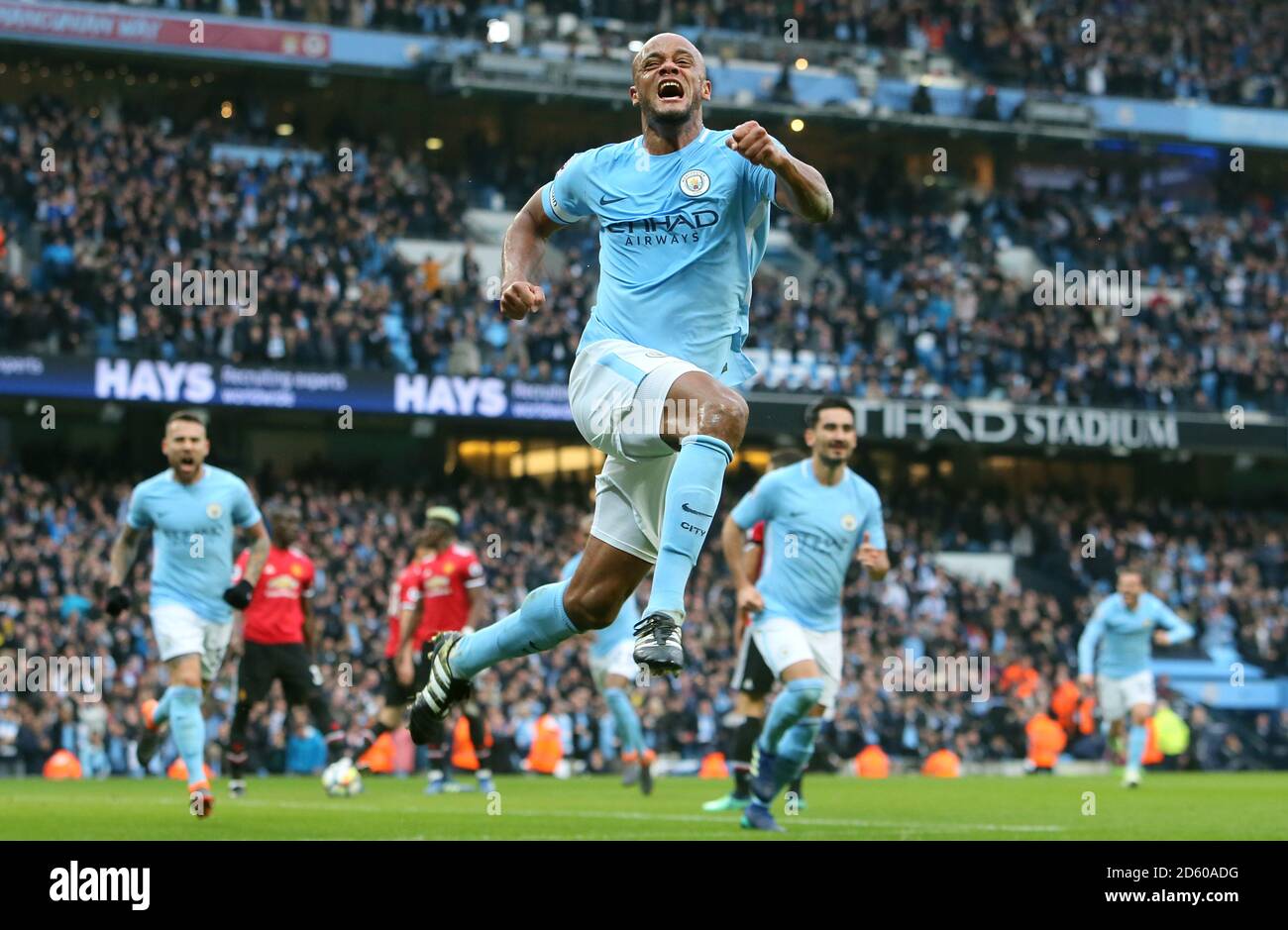 Manchester City's Vincent Kompany celebrates scoring his side's first ...