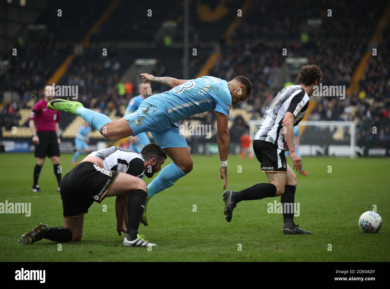 Coventry City's Jonson Clarke Harris collides with Notts County's ...
