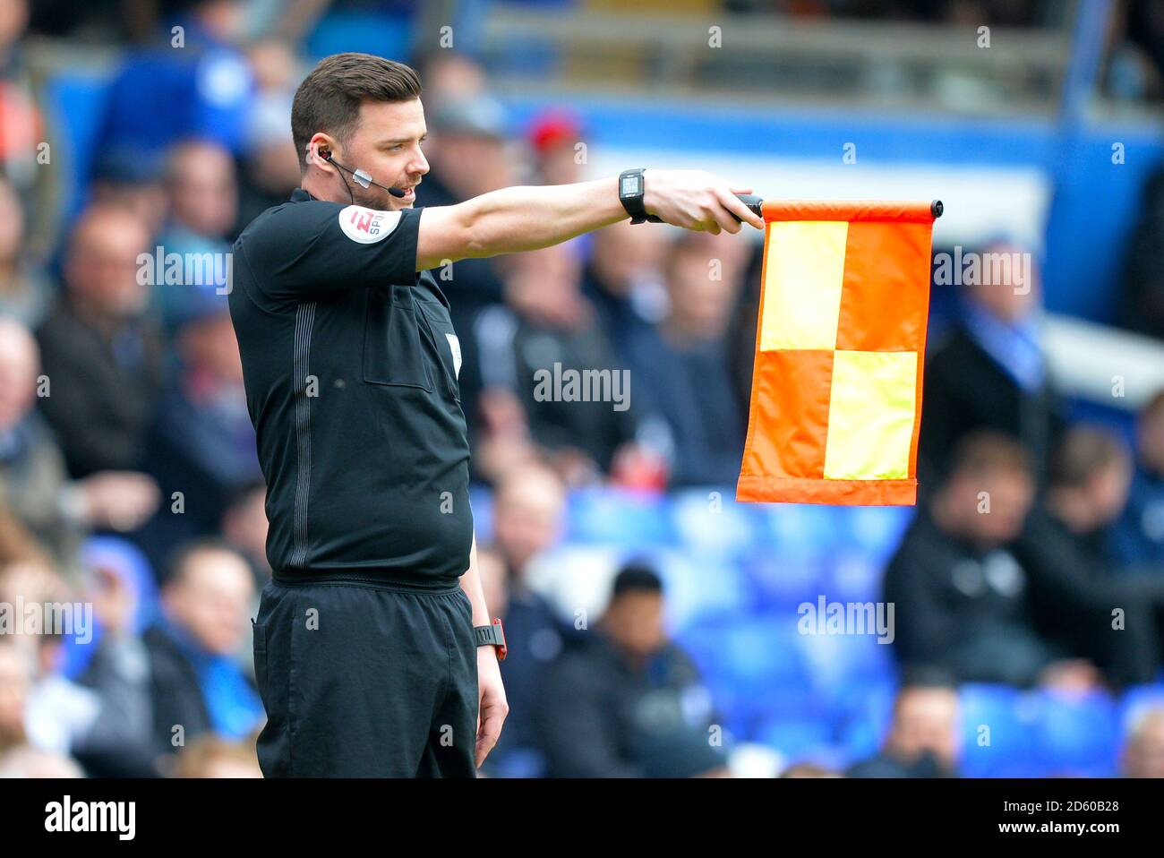 The linesman raises the flag Stock Photo - Alamy