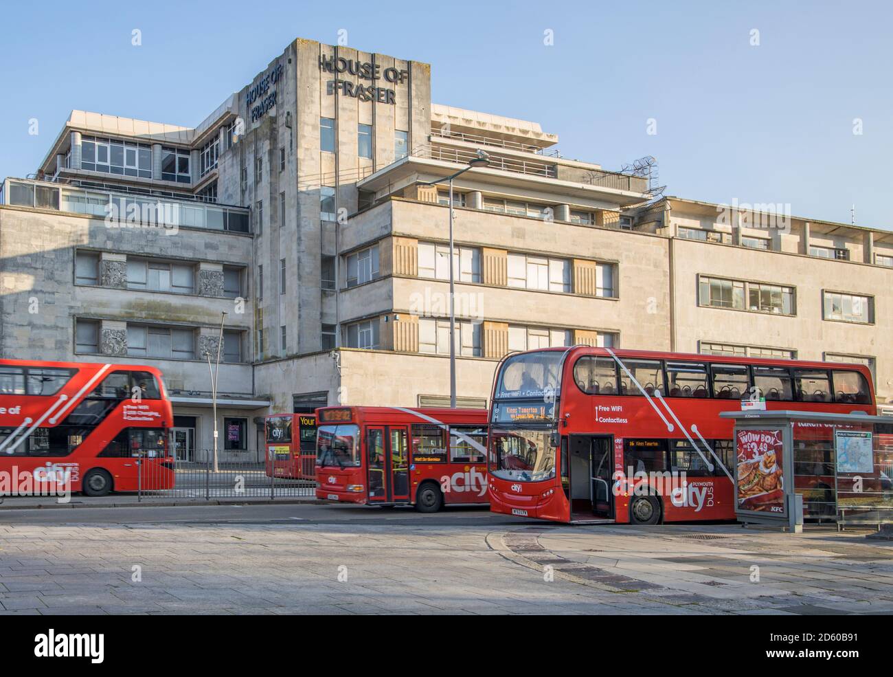 house of fraser and city red buses in plymouth city centre devon Stock ...