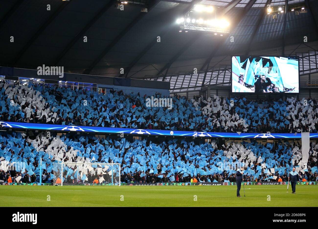 Manchester city fans show their support in the stands hi-res stock ...