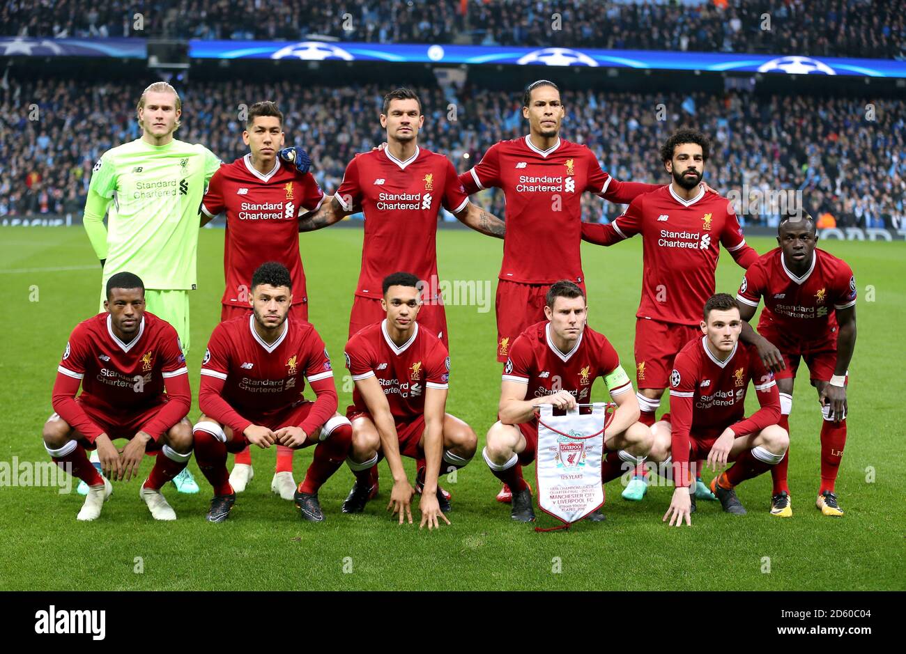 Liverpool Players line up before the match begins. (Back row, left to ...