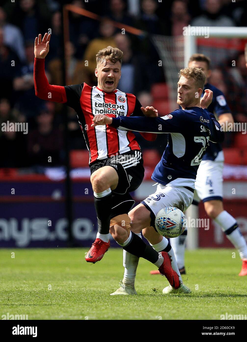 Sheffield United's Lee Evans (Left) and Millwall's George Saville ...