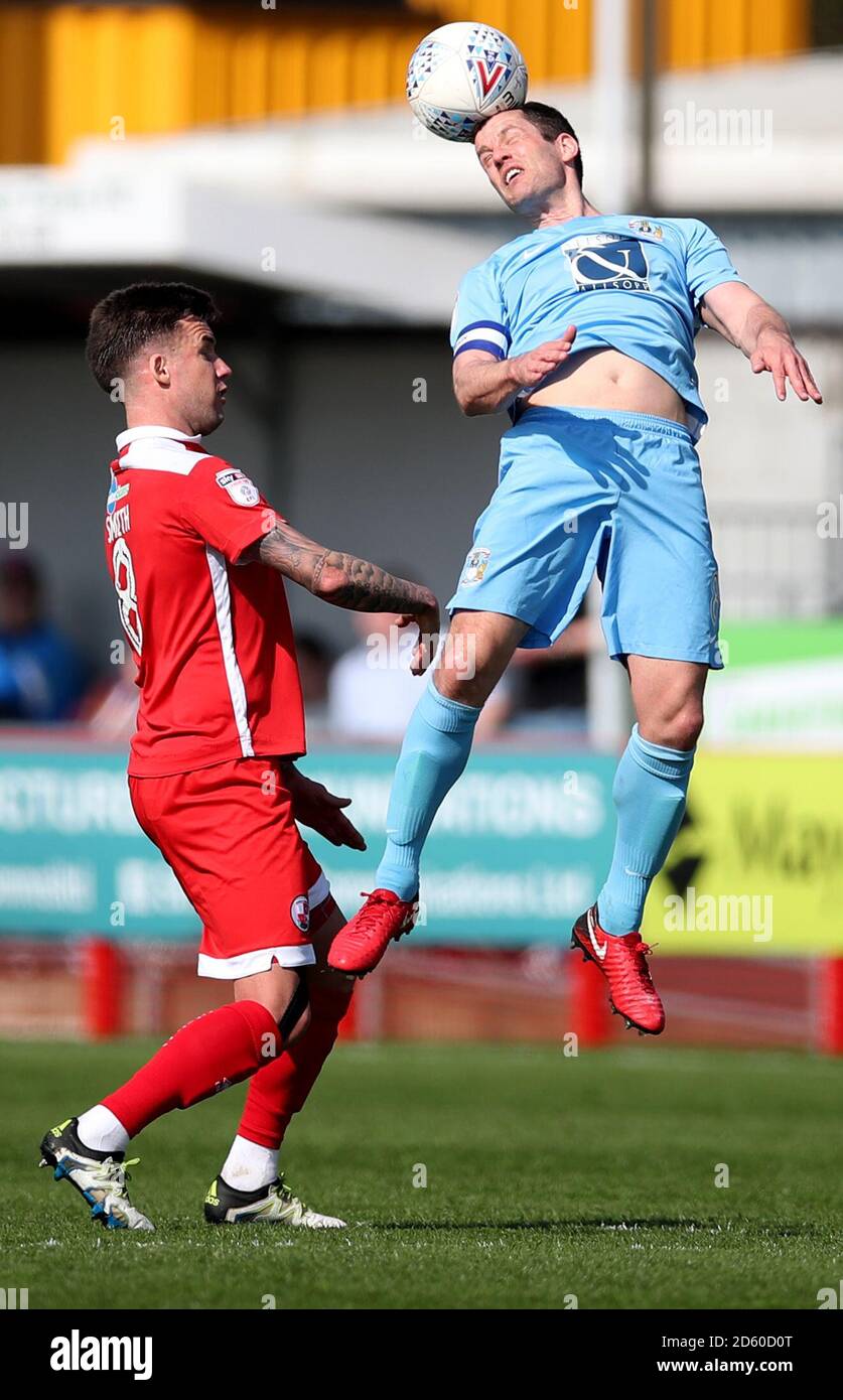 Coventry City's Marc McNulty wins the ball from Crawley Town's Jimmy ...