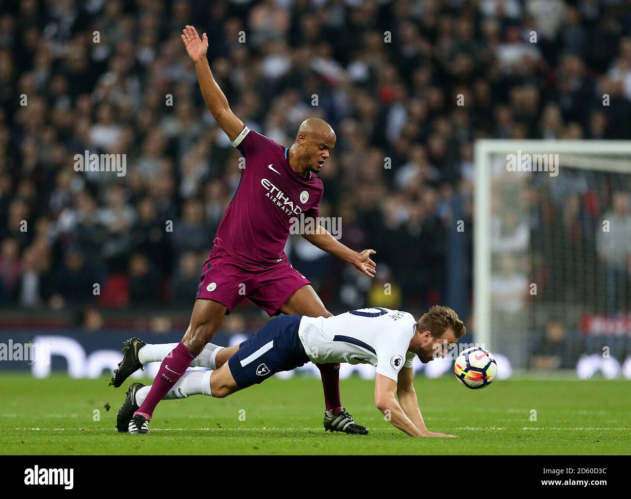 Tottenham Hotspur's Harry Kane and Manchester City's Vincent Kompany in ...