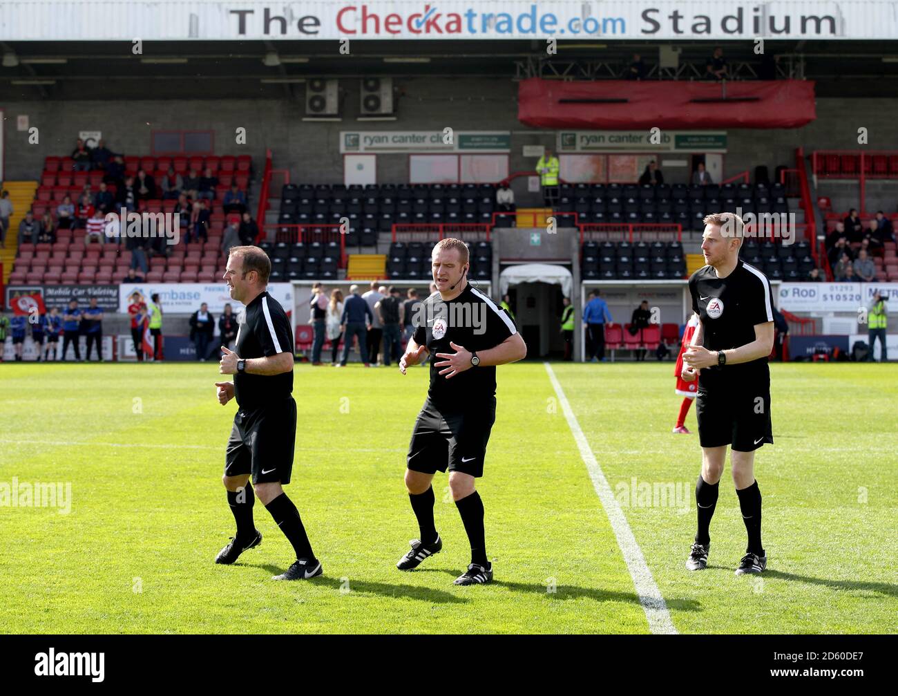 Match referee Lee Swabey (centre) warm-up before kick-off Stock Photo ...