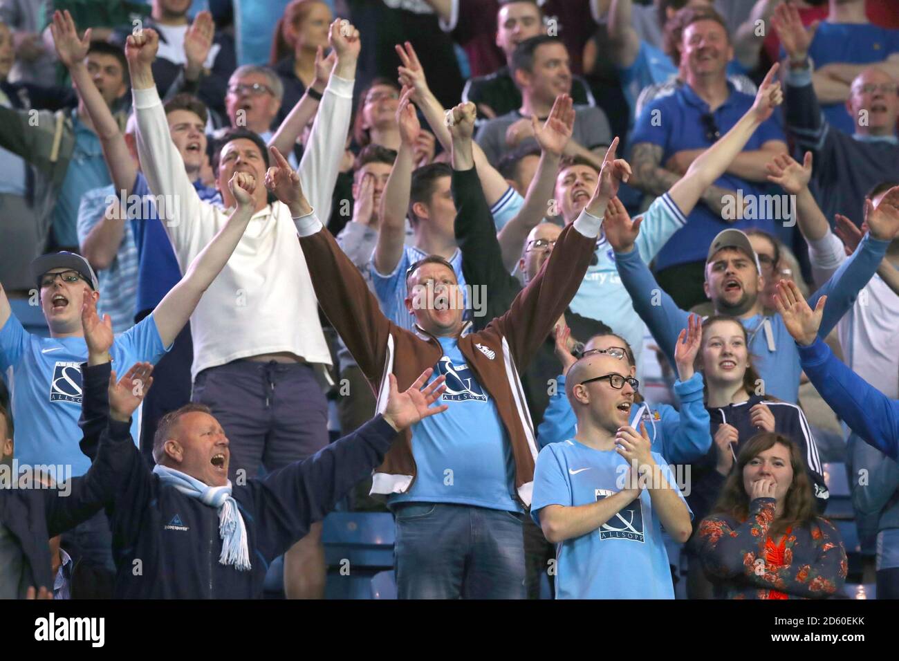 Coventry City fans in the stands Stock Photo - Alamy