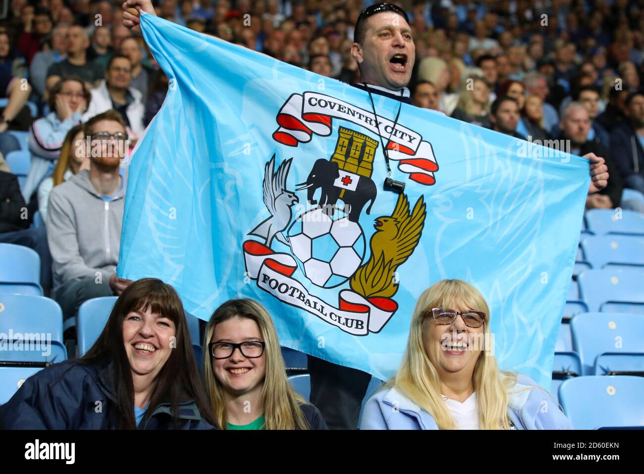 Coventry City fans in the stands Stock Photo - Alamy