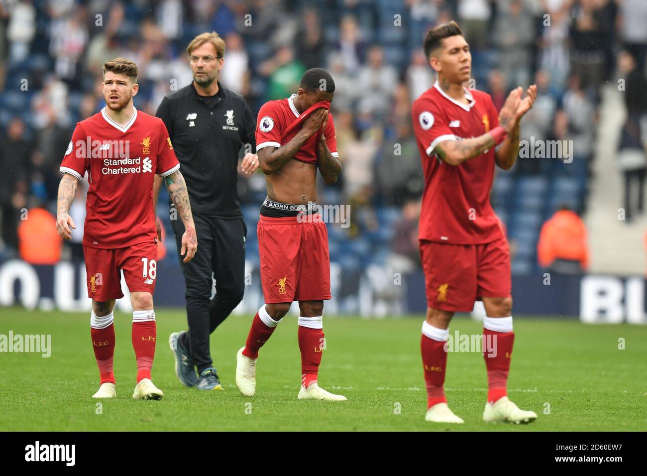 Liverpool players appear dejected at the final whistle Stock Photo - Alamy