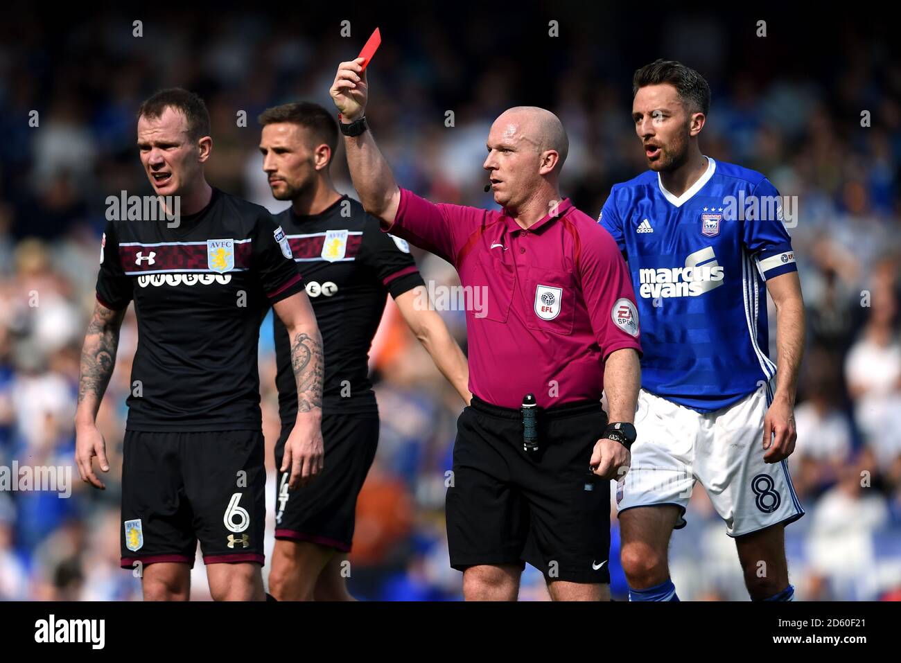 Ipswich Town's Grant Ward (out of picture) is shown a red card by ...