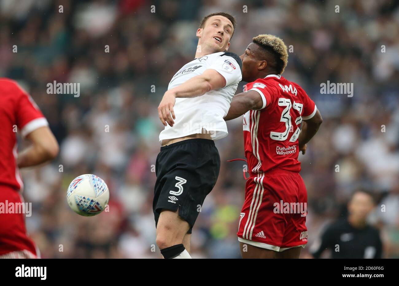 Derby County's Craig Forsyth and Middlesbrough's Adama Traore (right ...