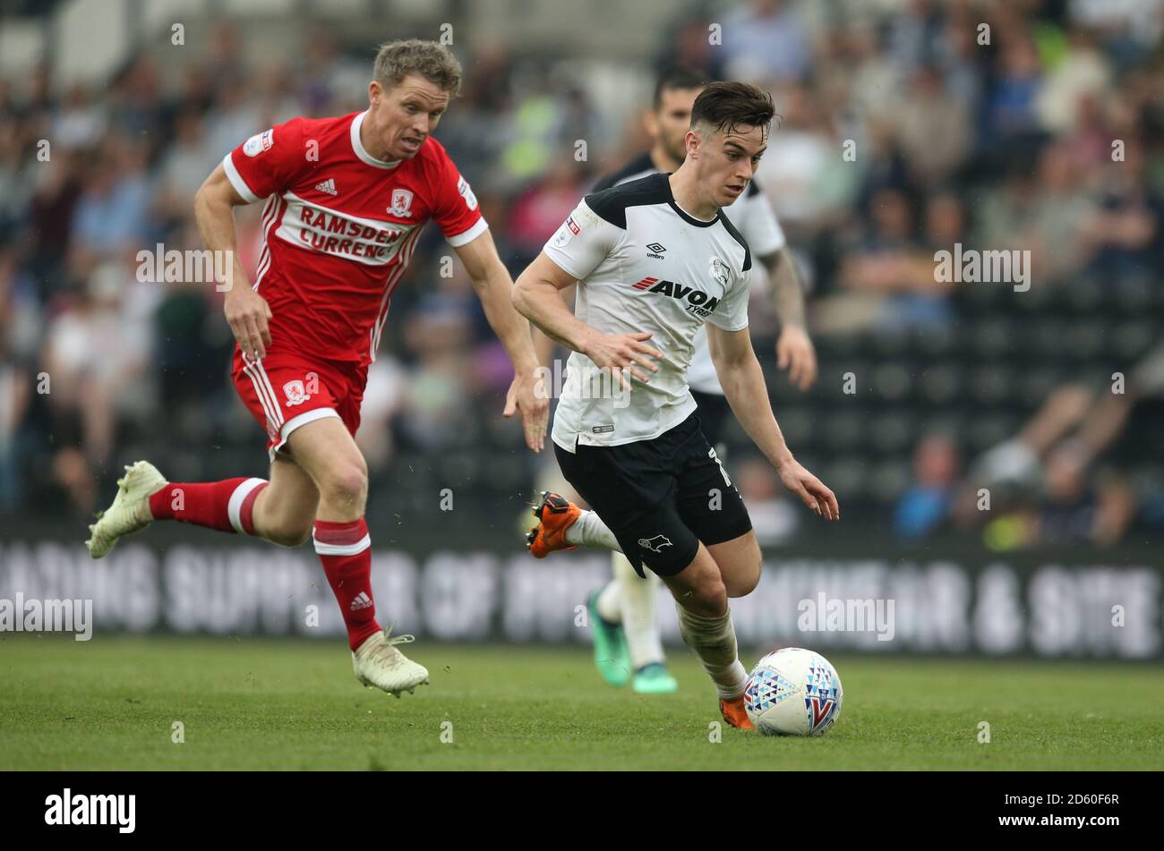 Derby County's Tom Lawrence and Middlesbrough's Grant Leadbitter (left ...