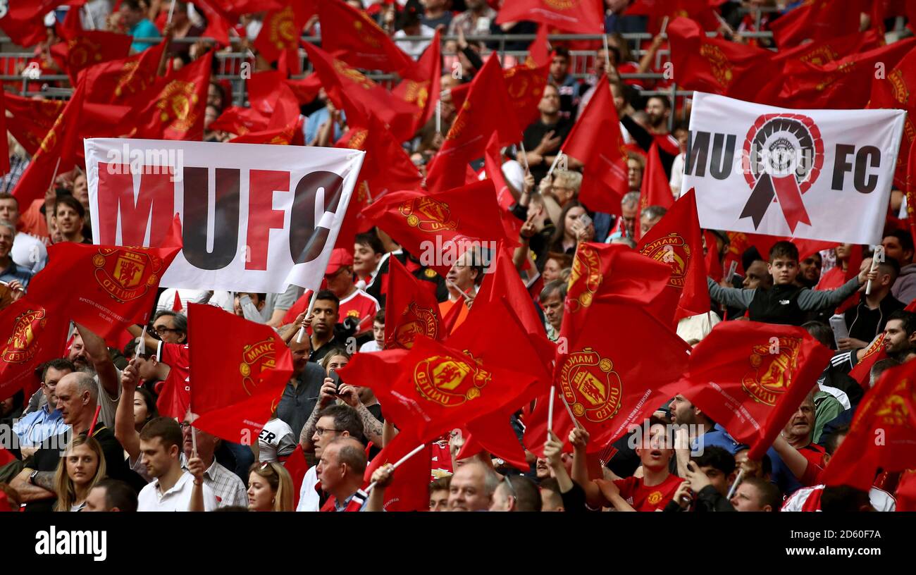 Manchester United fans with flags and banner prior to kick-off Stock ...