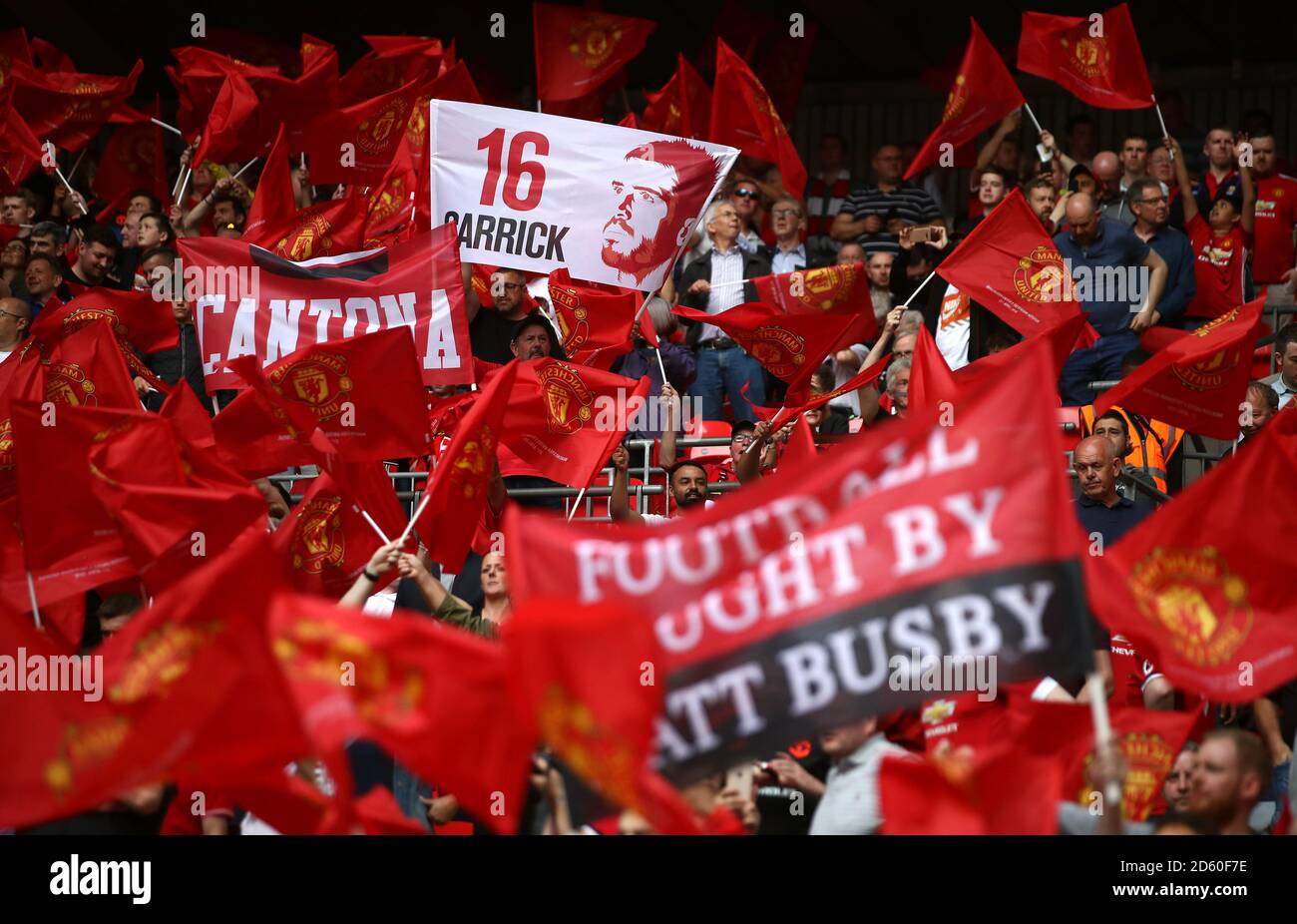 Manchester United fans with flags and banner prior to kick-off Stock ...