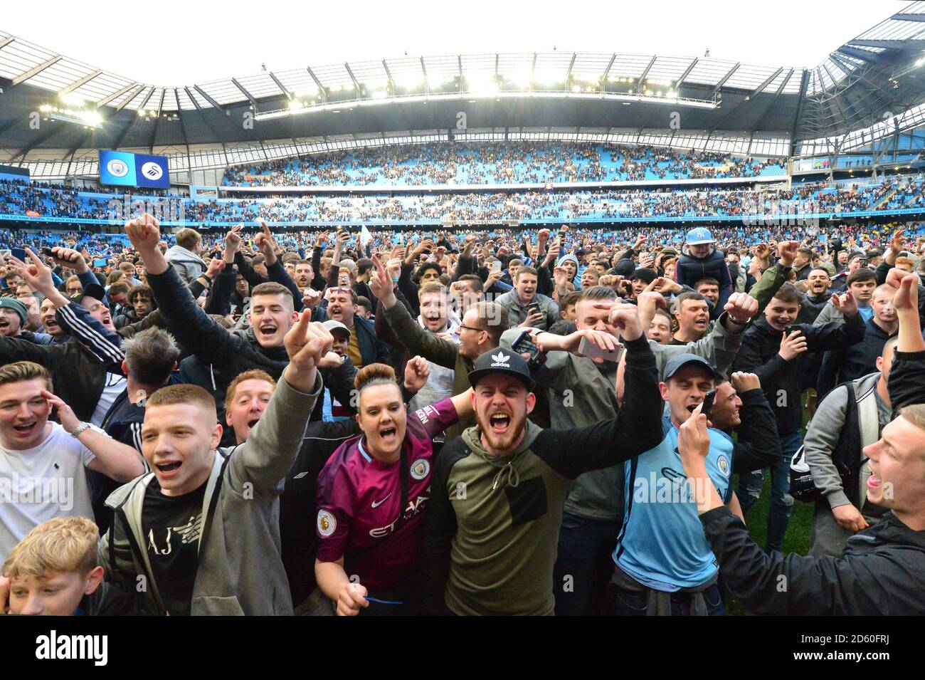 Fans invade the pitch after the final whistle Stock Photo - Alamy