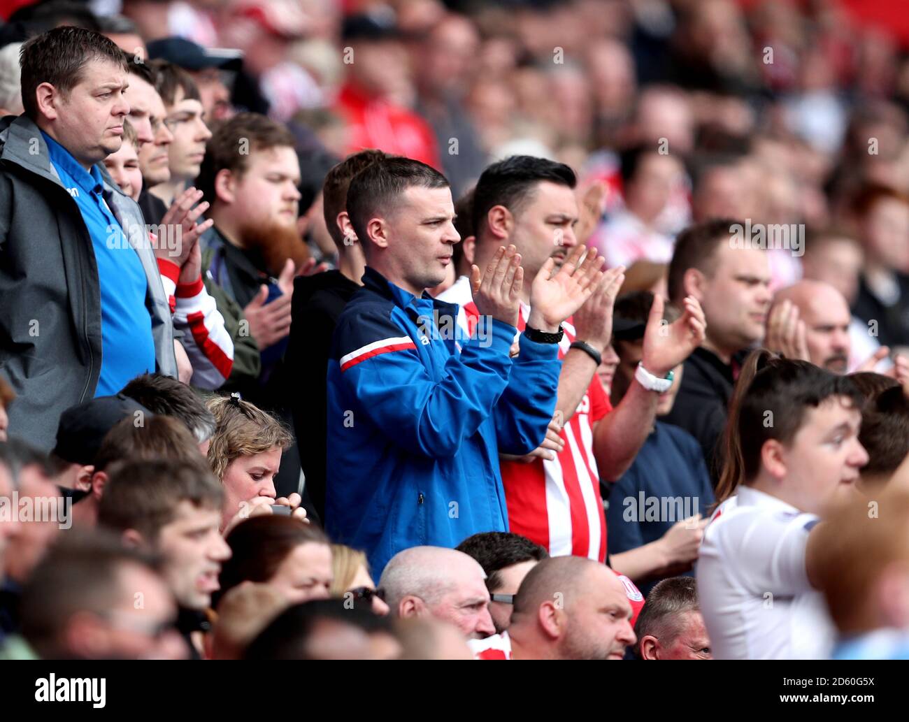 Stoke City fans in the stands show their support Stock Photo - Alamy
