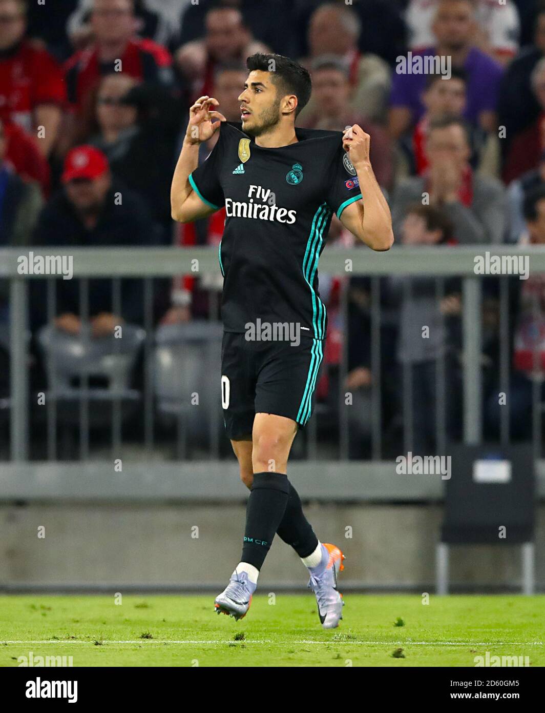 Real madrids marco asensio celebrates scoring hi-res stock photography ...