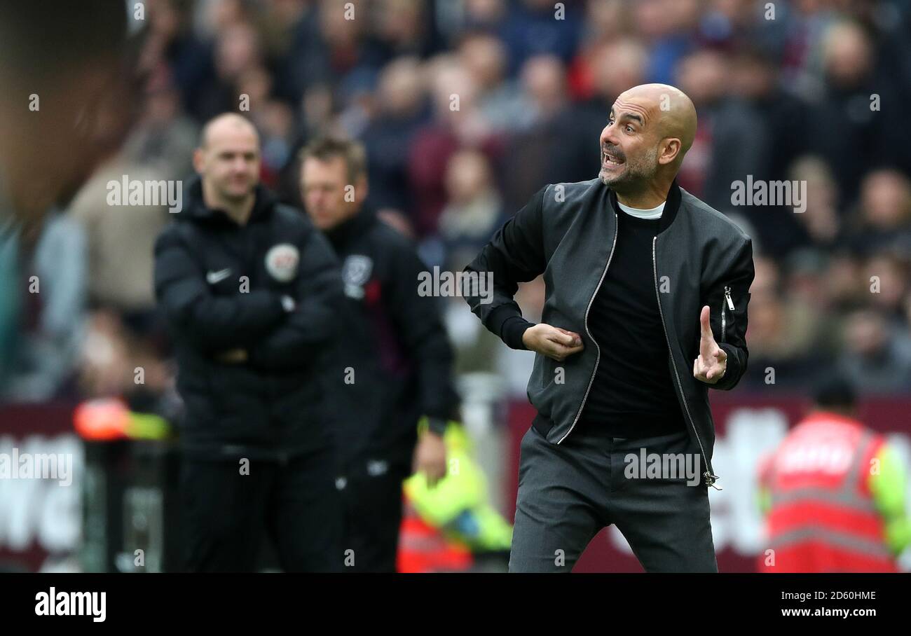 Manchester City manager Pep Guardiola gestures on the touchline Stock ...