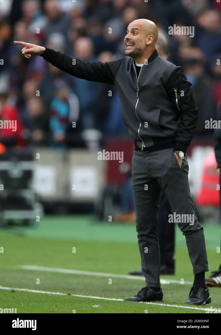 Manchester City manager Pep Guardiola gestures on the touchline Stock ...