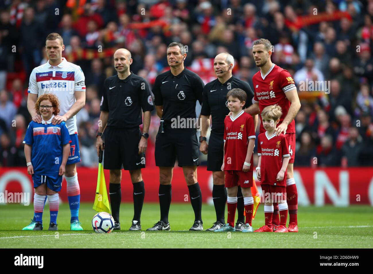Stoke City's Ryan Shawcross and Liverpool's Jordan Henderson line up ...